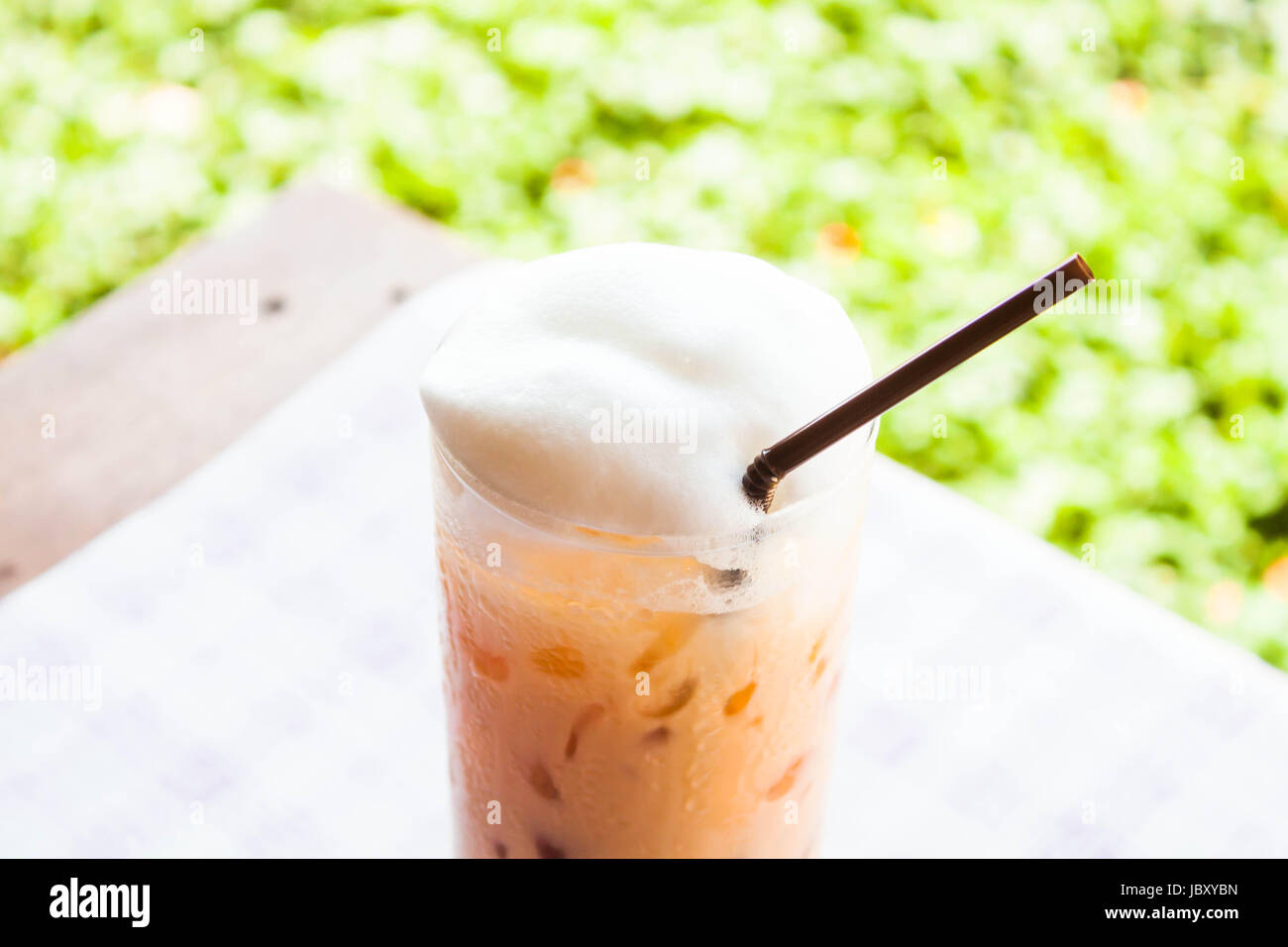 Break time with cold thai milk tea Stock Photo - Alamy