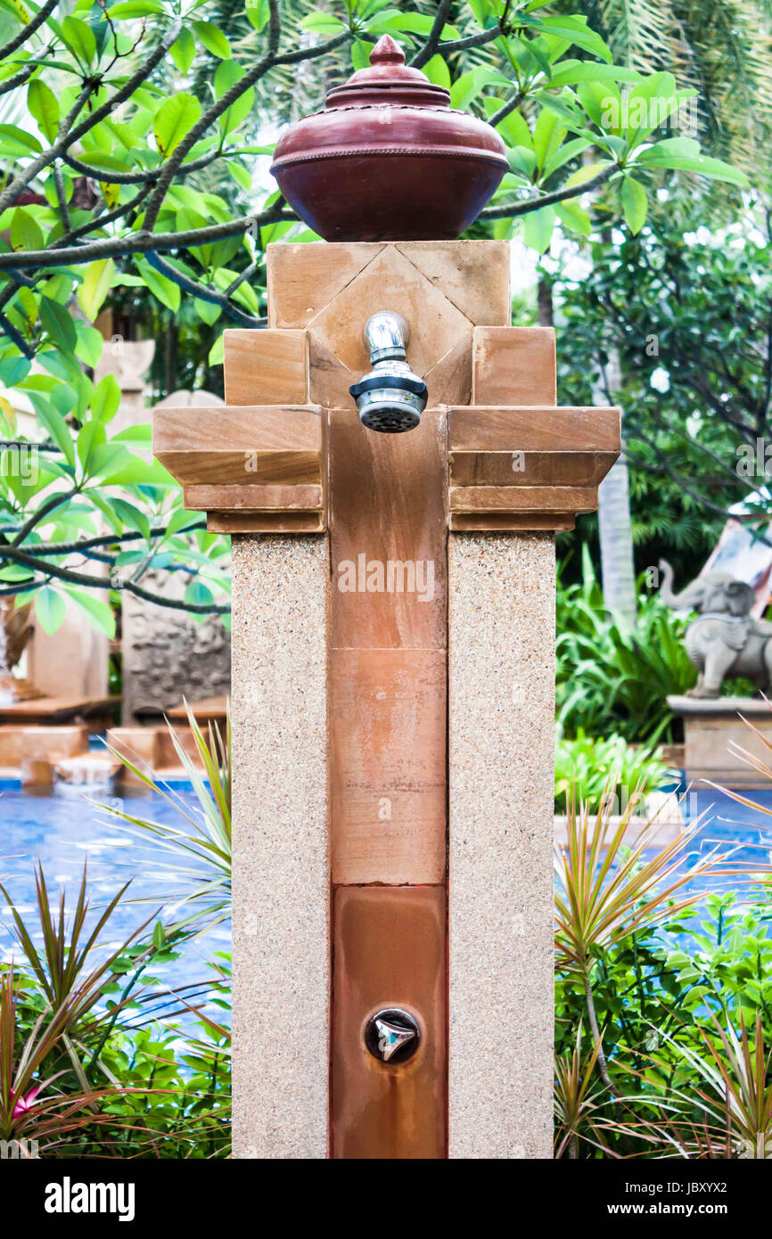 Beautiful outdoor shower area for swimming pool Stock Photo - Alamy