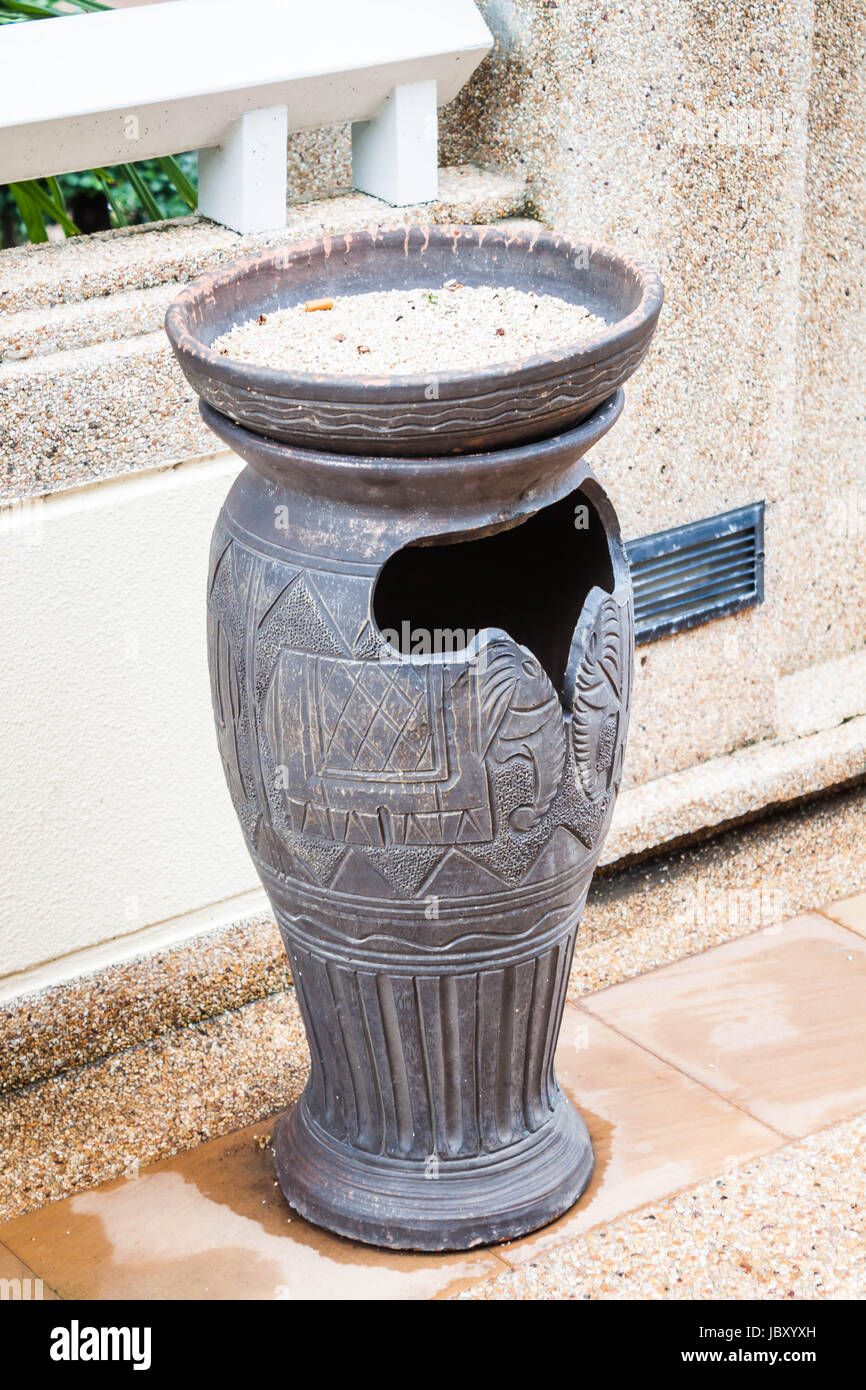 Park ceramic trash bin in smoking area Stock Photo - Alamy