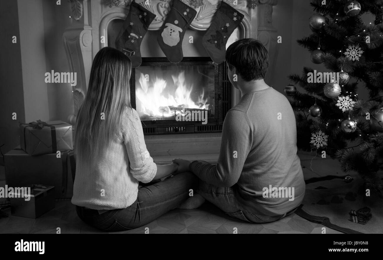 Couple Sitting By Fireside High Resolution Stock Photography and Images ...