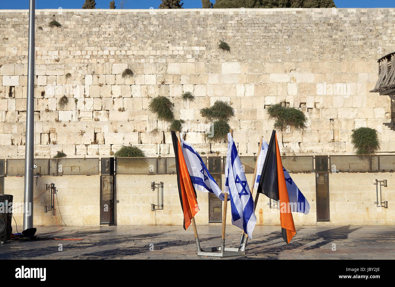 Israeli flags and army flags are waving at the Western Wall in the ...