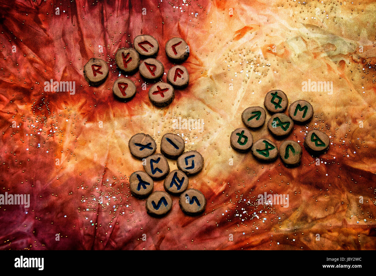 set of wooden runes, an ancient alphabet known as the futhark are ...