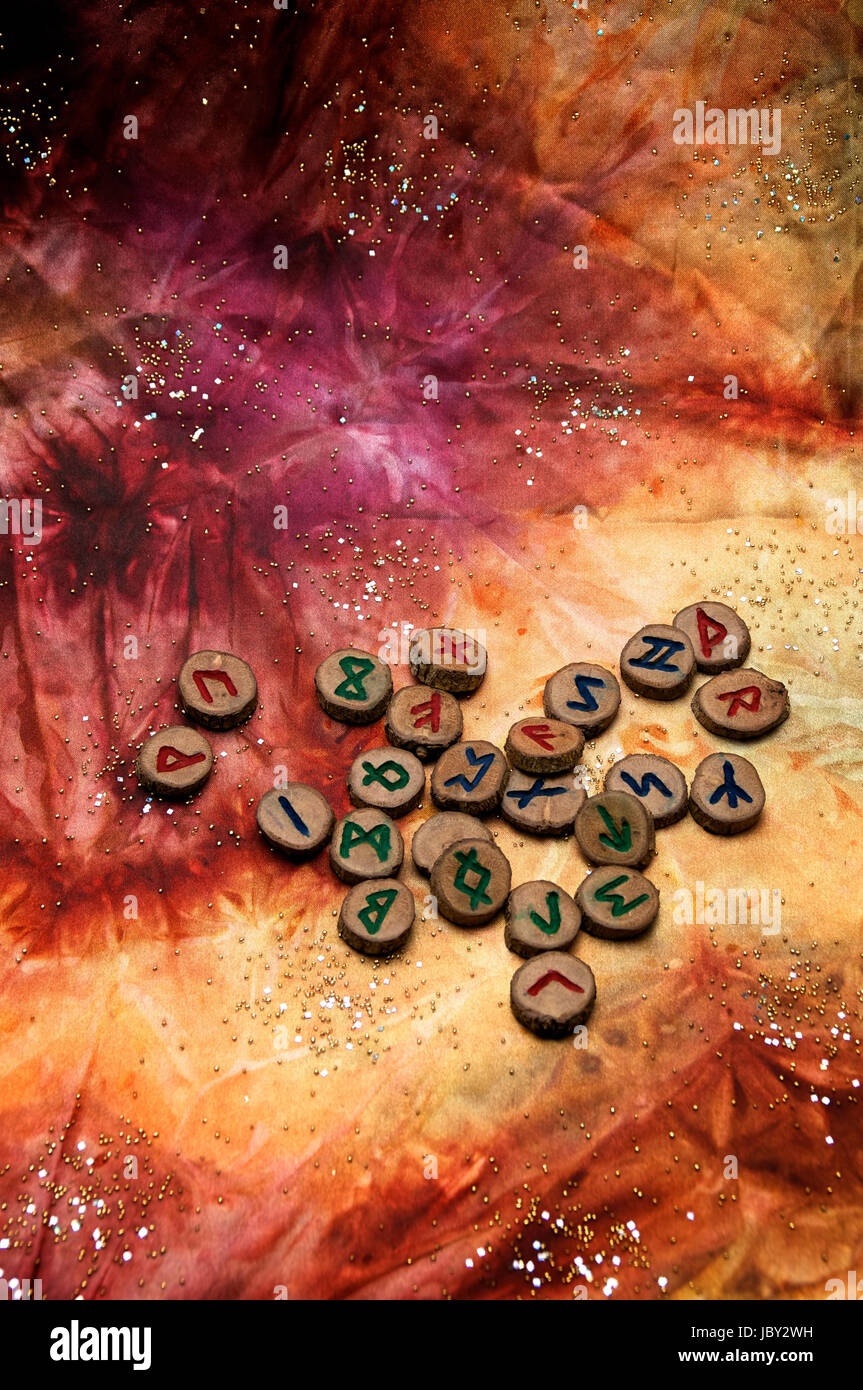hand carved and painted wooden runes, an ancient alphabet known as the ...
