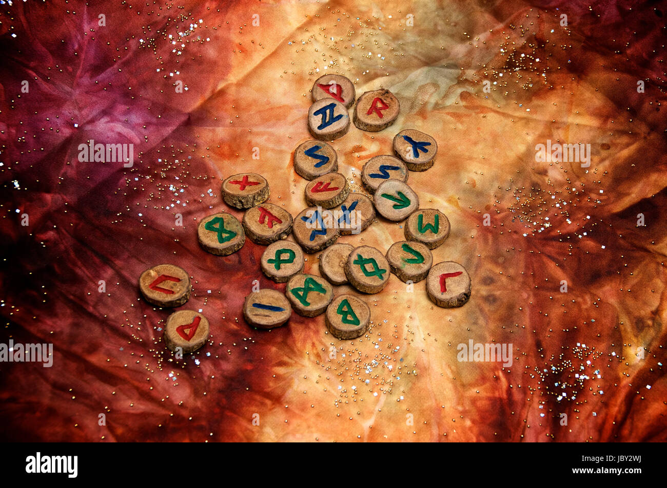 hand carved and painted wooden runes, an ancient alphabet known as the ...