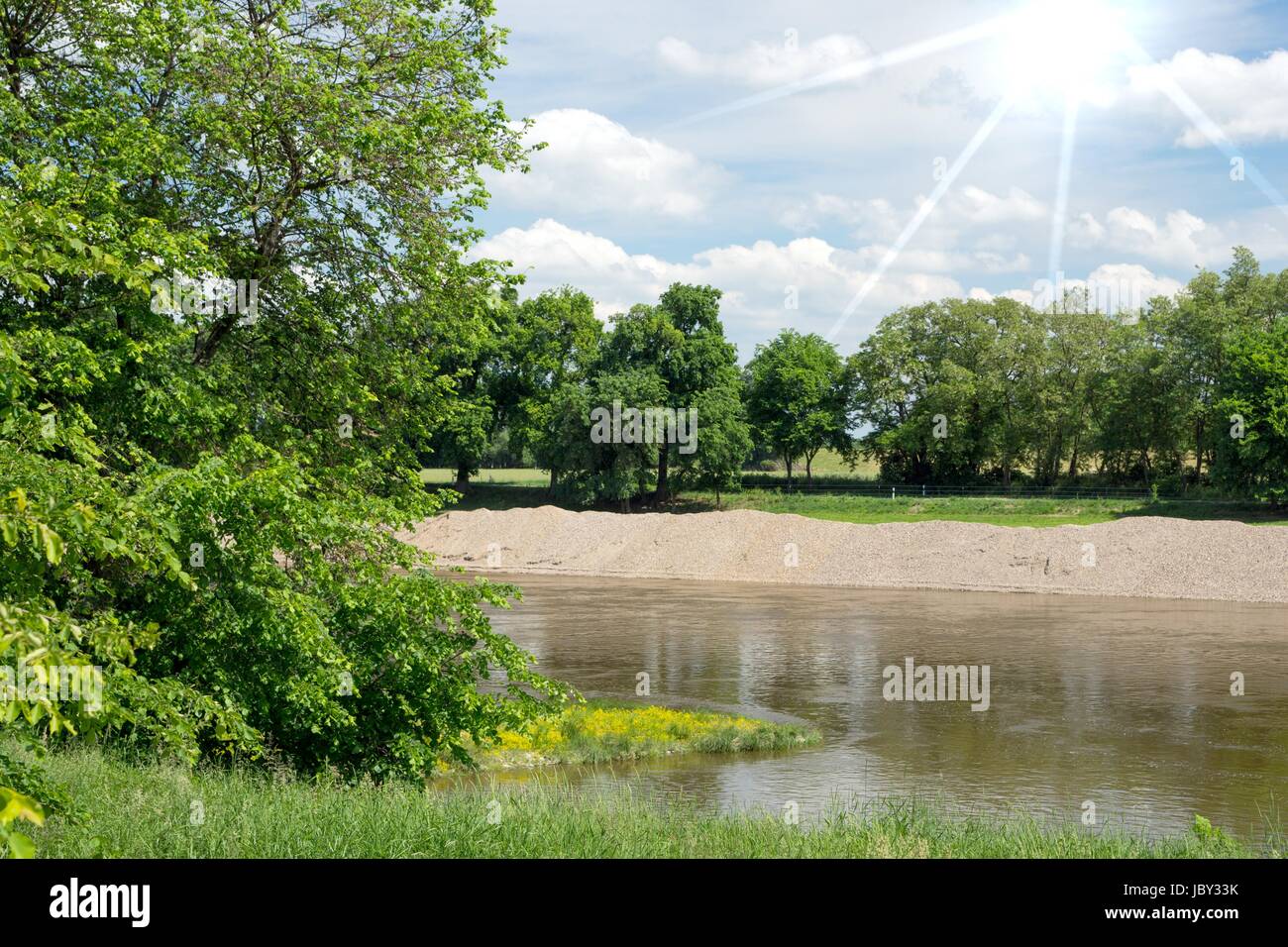 Landscape with river and sun Stock Photo - Alamy