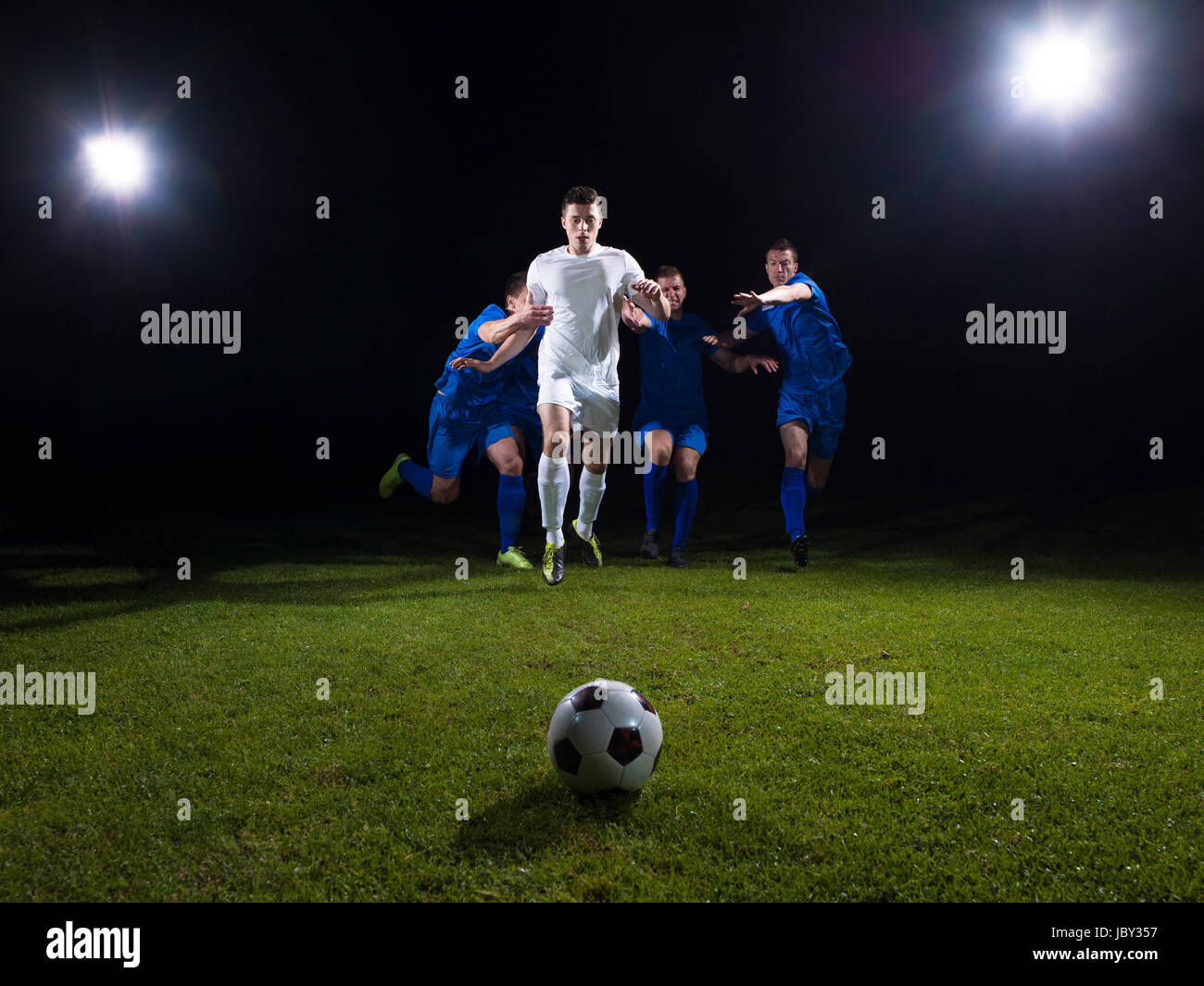 soccer football team player game duel isolated on black background ...