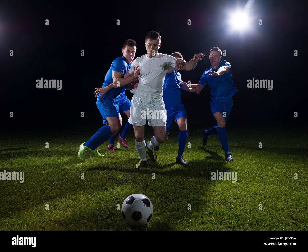 soccer football team player game duel isolated on black background ...