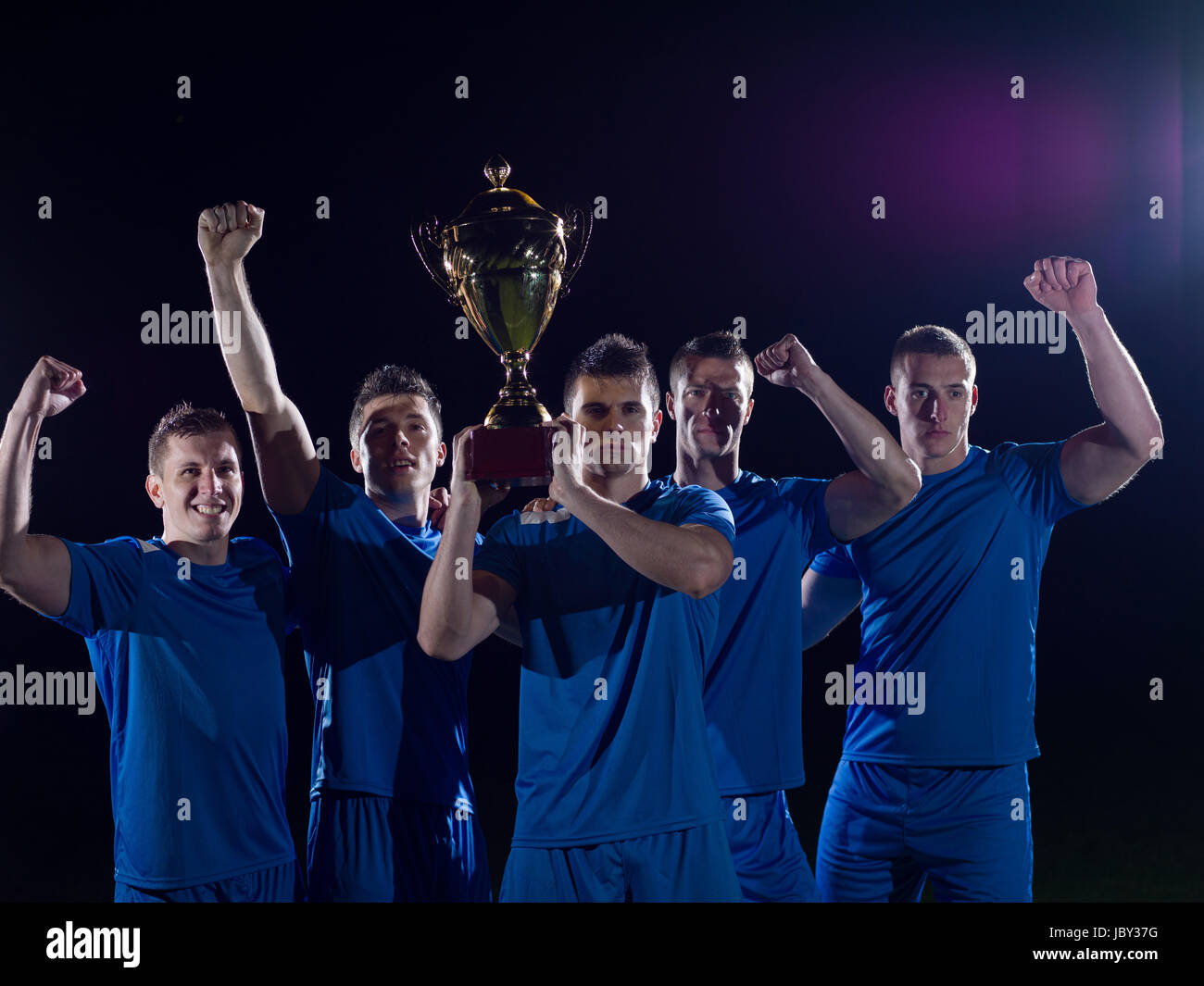 soccer players team group celebrating the victory and become champion ...