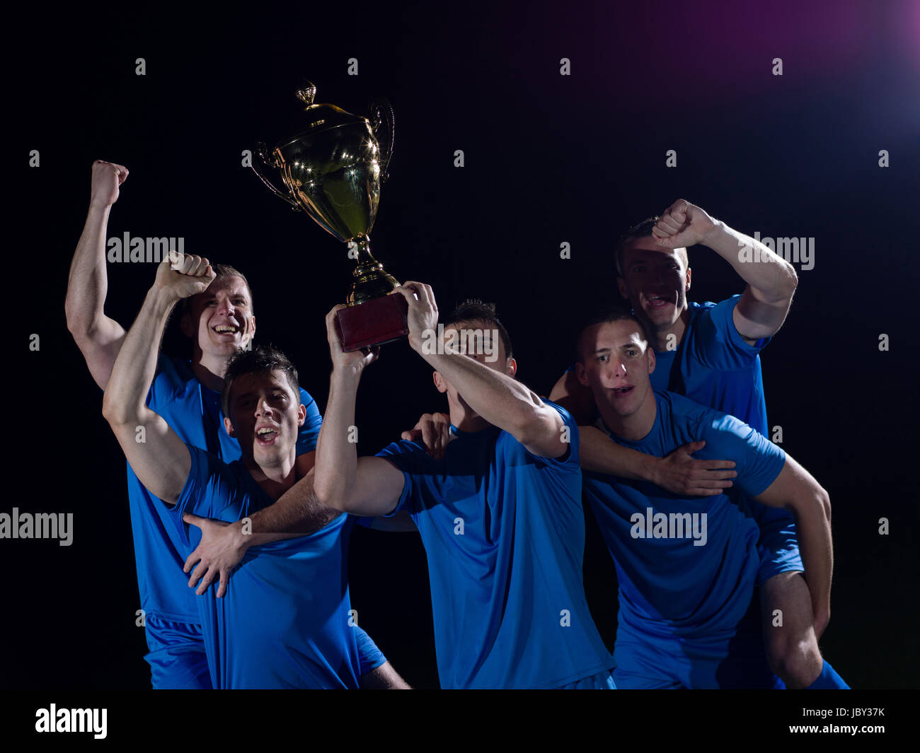 soccer players team group celebrating the victory and become champion ...