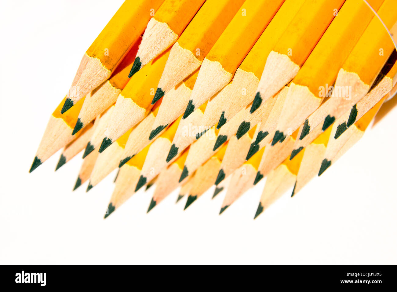 many pencils over a grey background Stock Photo - Alamy