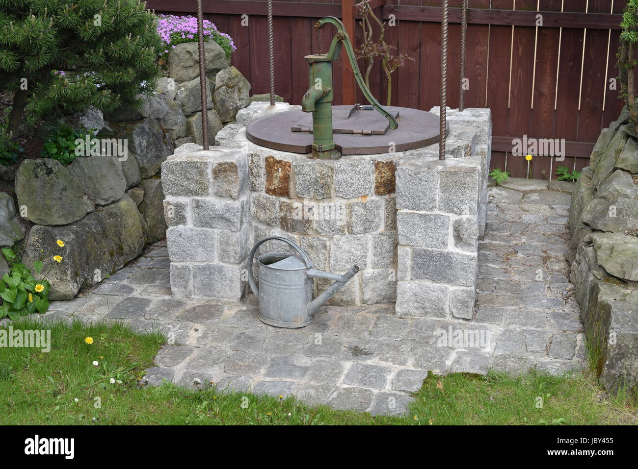 Water Well in the Garden Stock Photo - Alamy