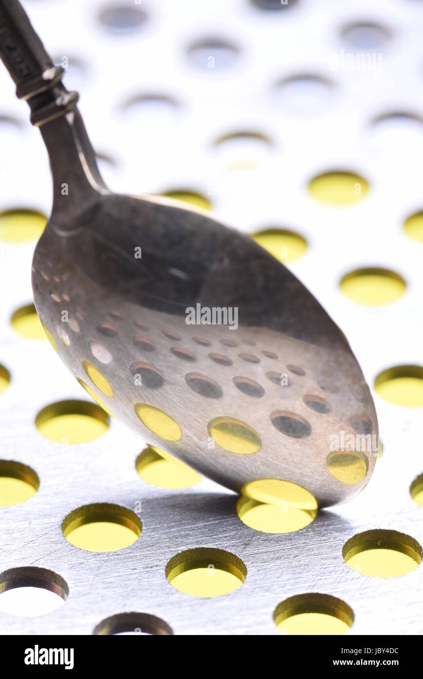 Spoon on a table with abstract light reflection Stock Photo - Alamy
