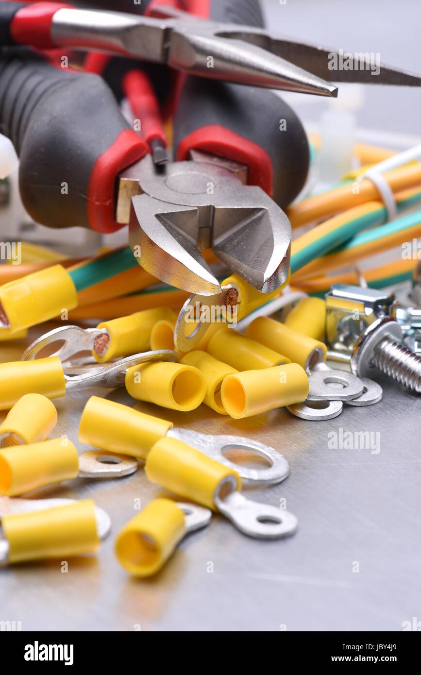 Tools for electrician and cables on metal surface Stock Photo - Alamy