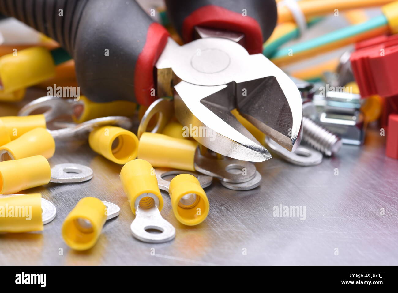 Tools for electrician and cables on metal surface Stock Photo - Alamy