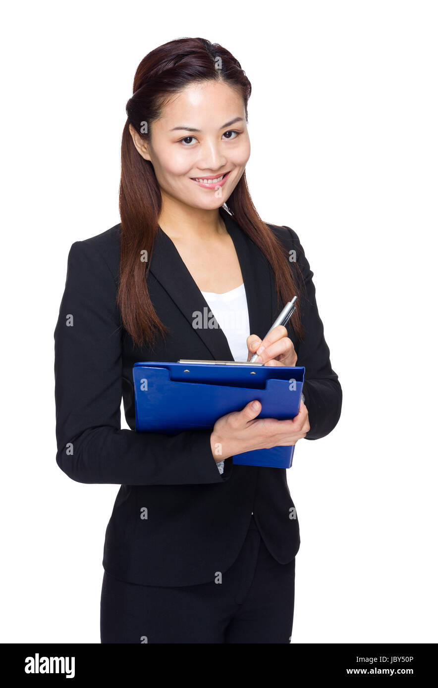 Business woman write on clipboard Stock Photo - Alamy