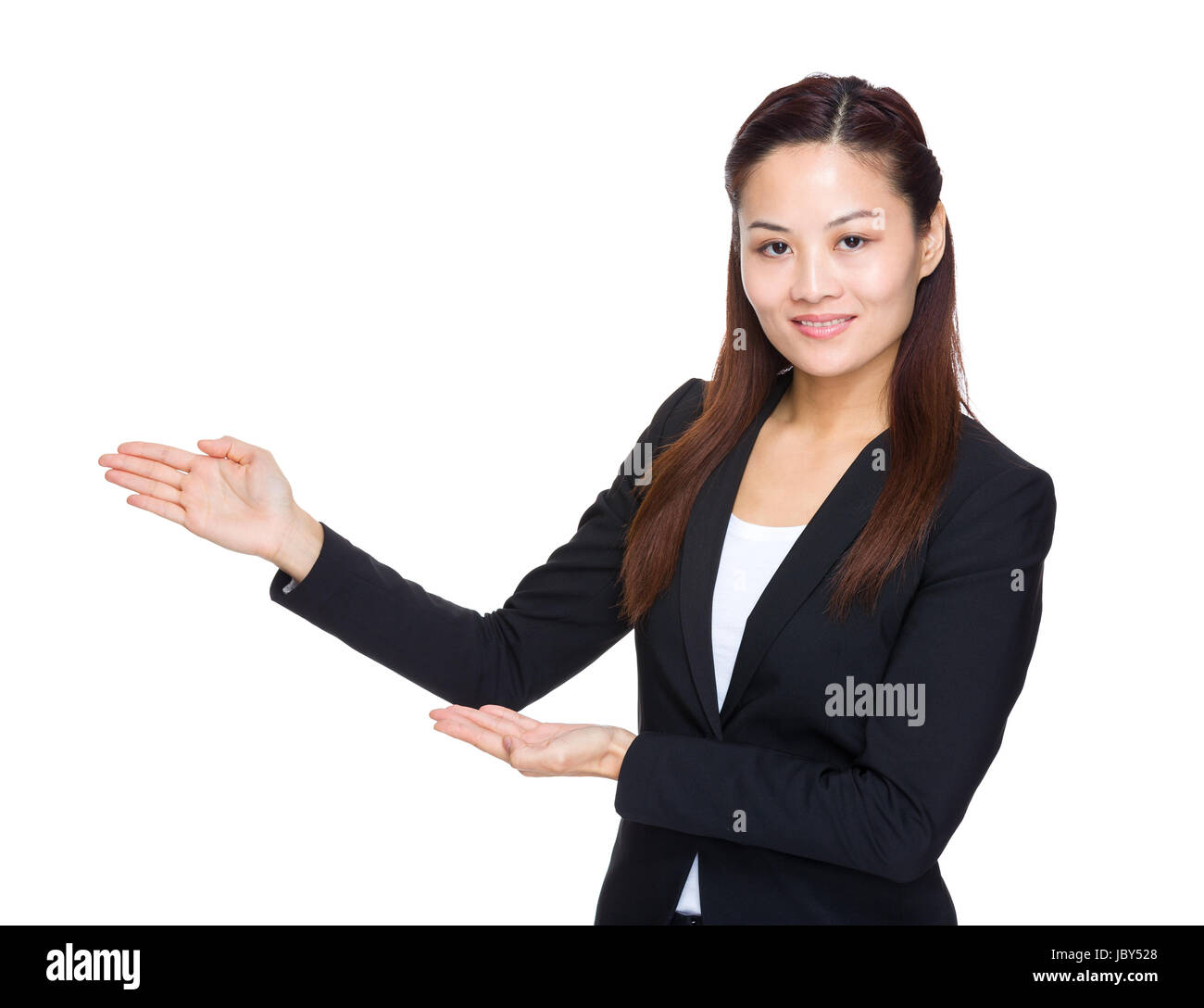 Business woman with hand presentation Stock Photo - Alamy