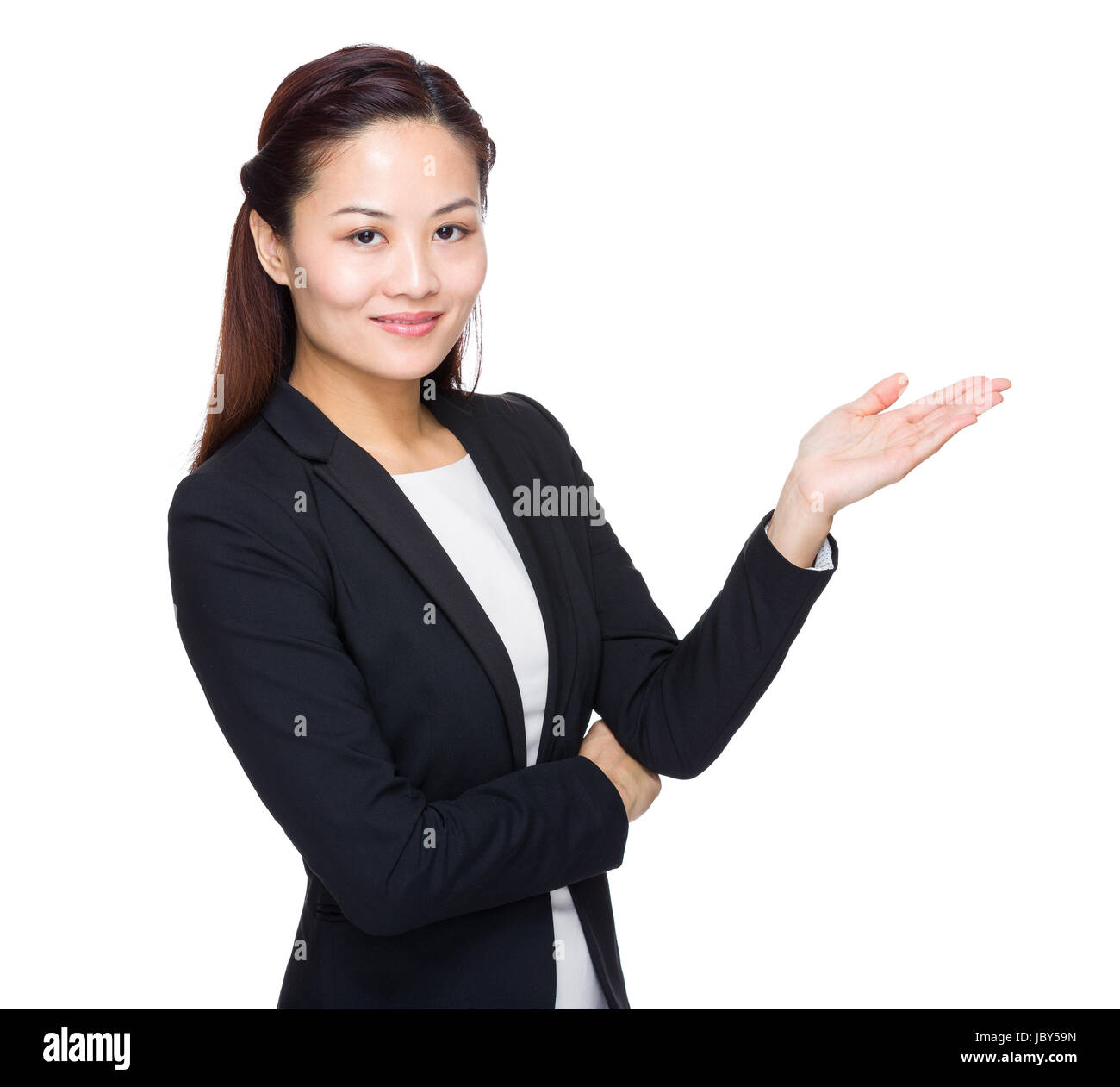 Business woman with hand presentation Stock Photo - Alamy