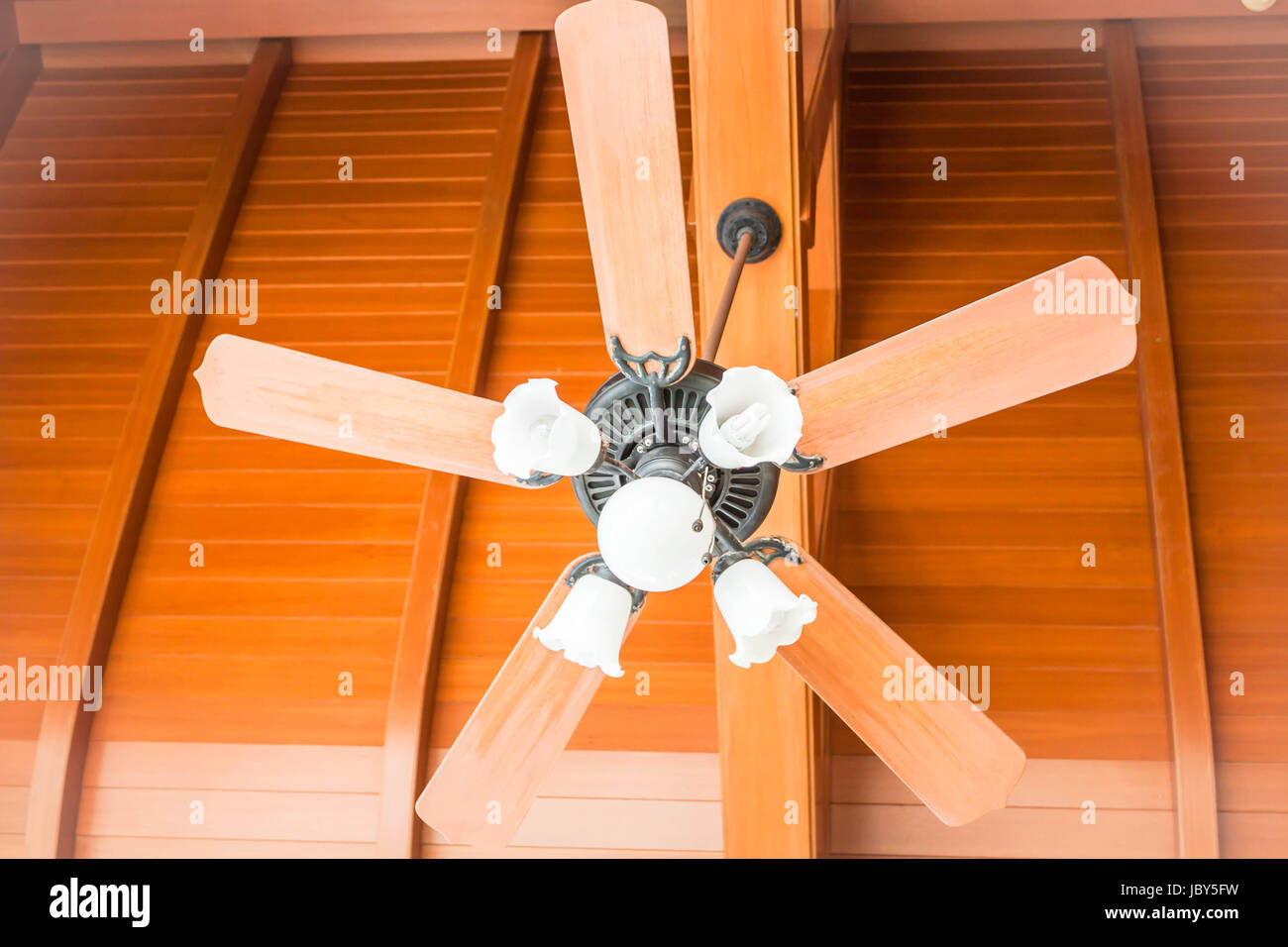 Close up beautiful hanging ceiling fan with glass lamps Stock Photo - Alamy