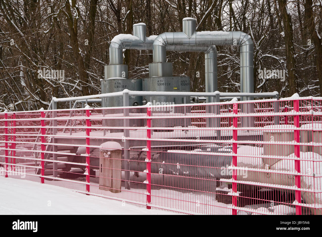Community heating pipeline in wintertime having a lot of snow and ice ...