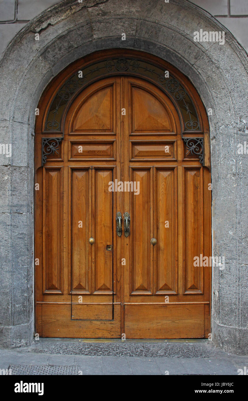 Old antique stone building entrance with wooden door Stock Photo - Alamy