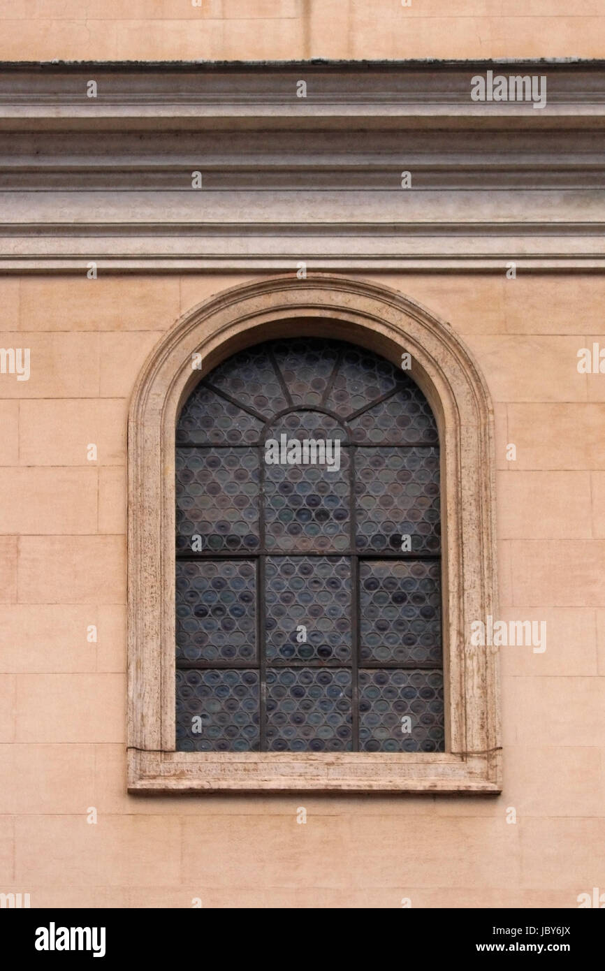 Medieval closed glass window outside of old building Stock Photo - Alamy