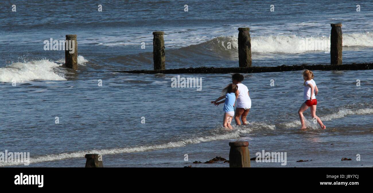 Jumping the waves Stock Photo - Alamy