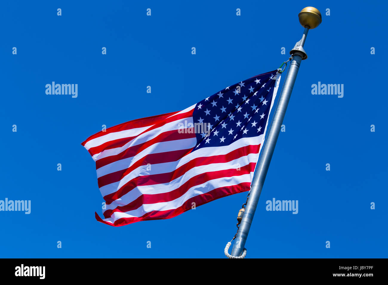 American flag on flagpole Stock Photo - Alamy