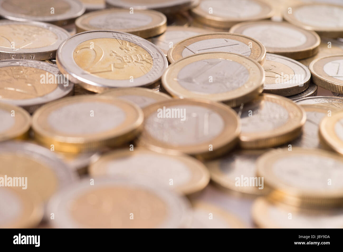 many euro coins Stock Photo - Alamy