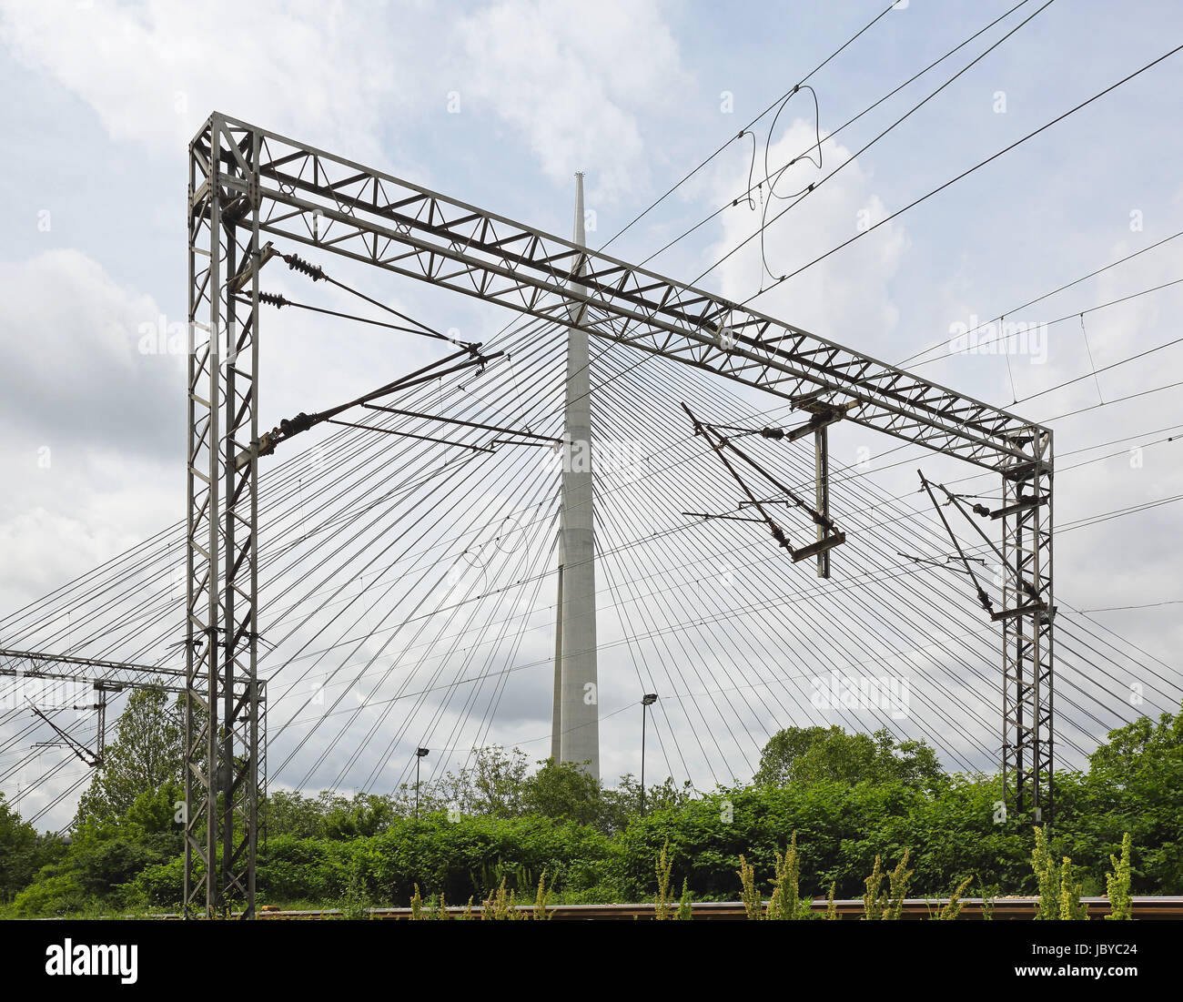Overhead train line electrical transmission system Stock Photo - Alamy
