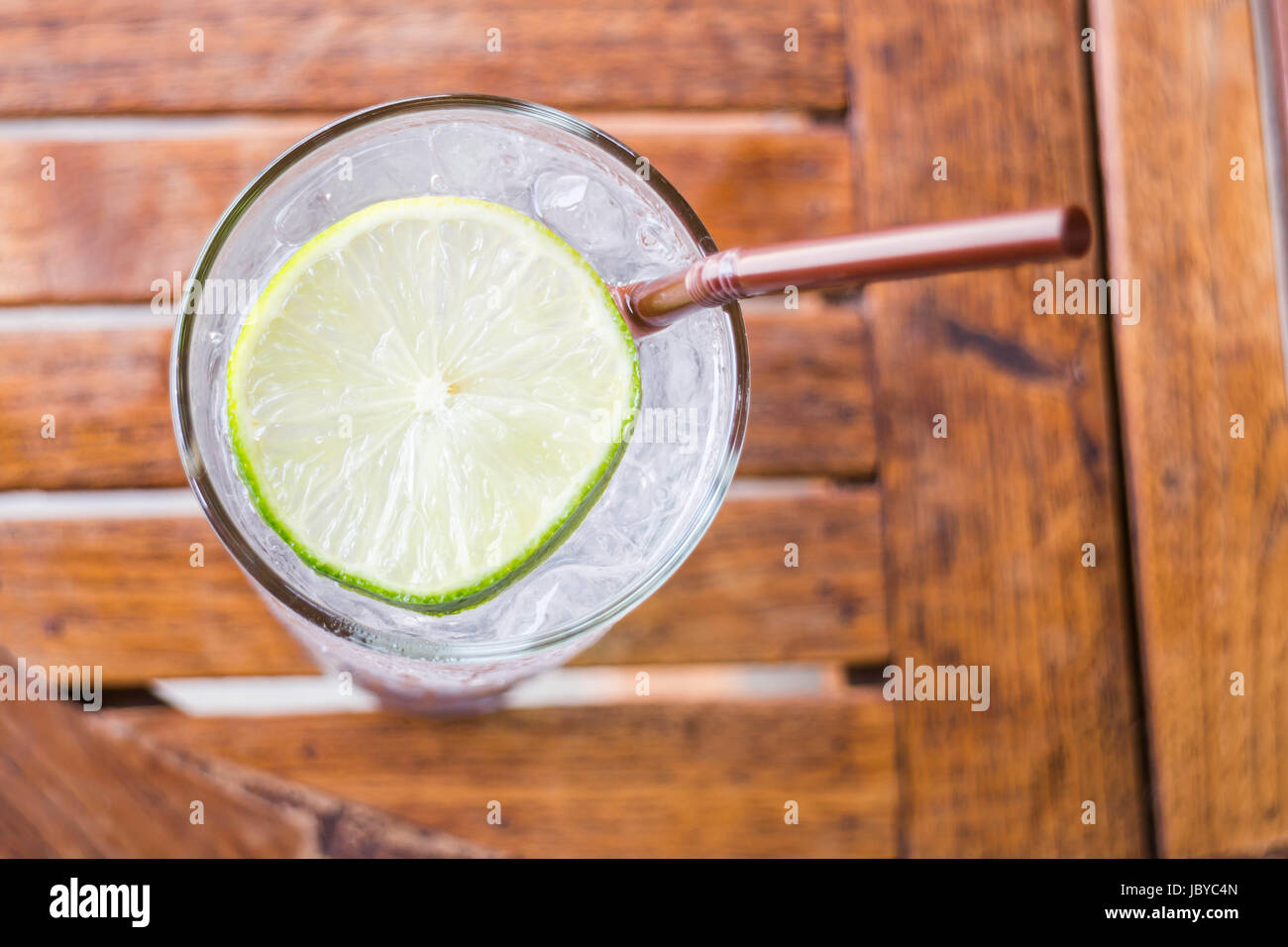 Glass of iced lemon juice up close, stock photo Stock Photo - Alamy
