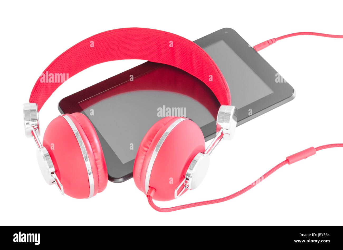 Bright red headphones and black tablet pc for modern distance education ...