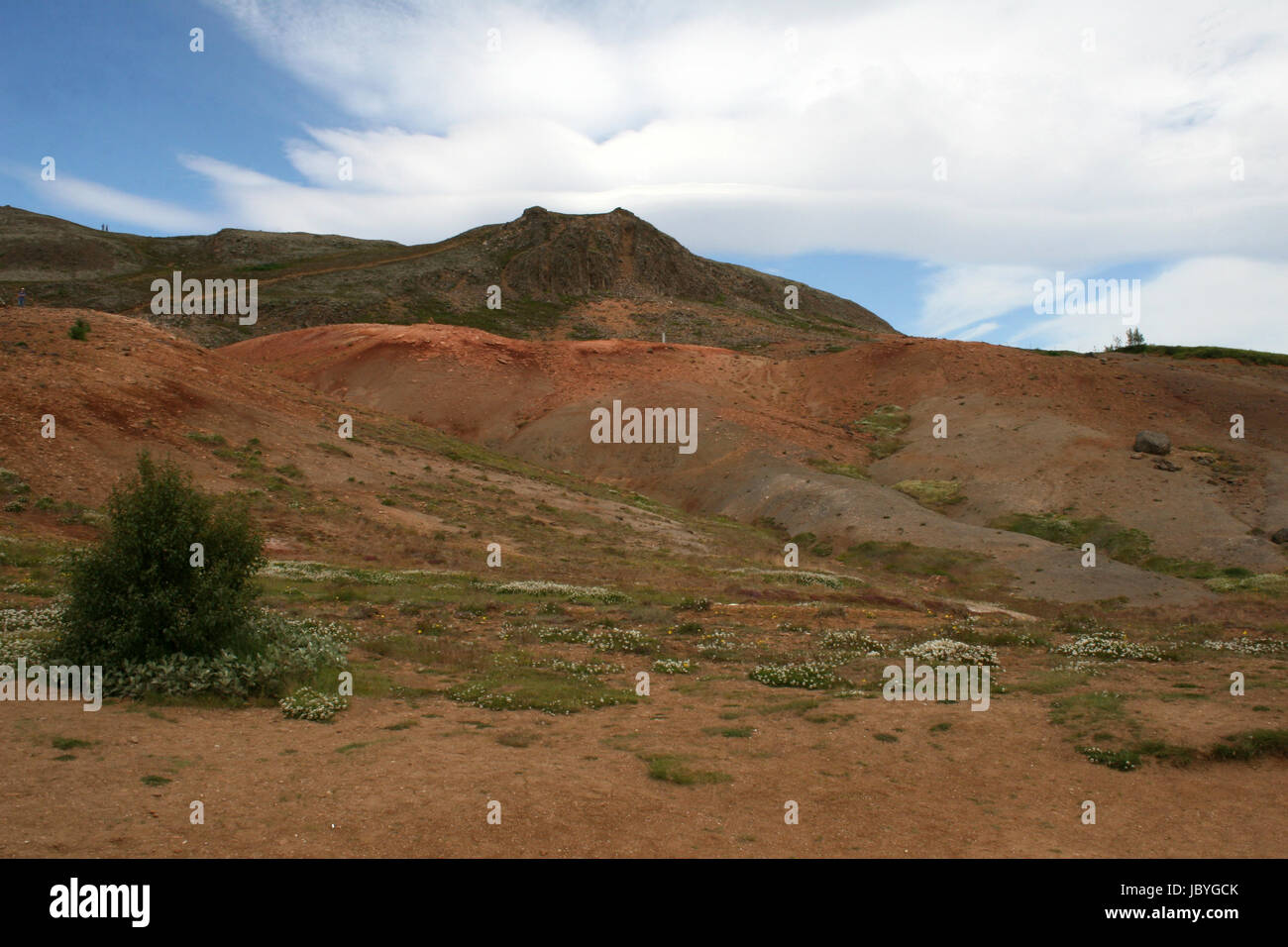 Red volcanic Icelandic landscape at Geyser Stock Photo - Alamy