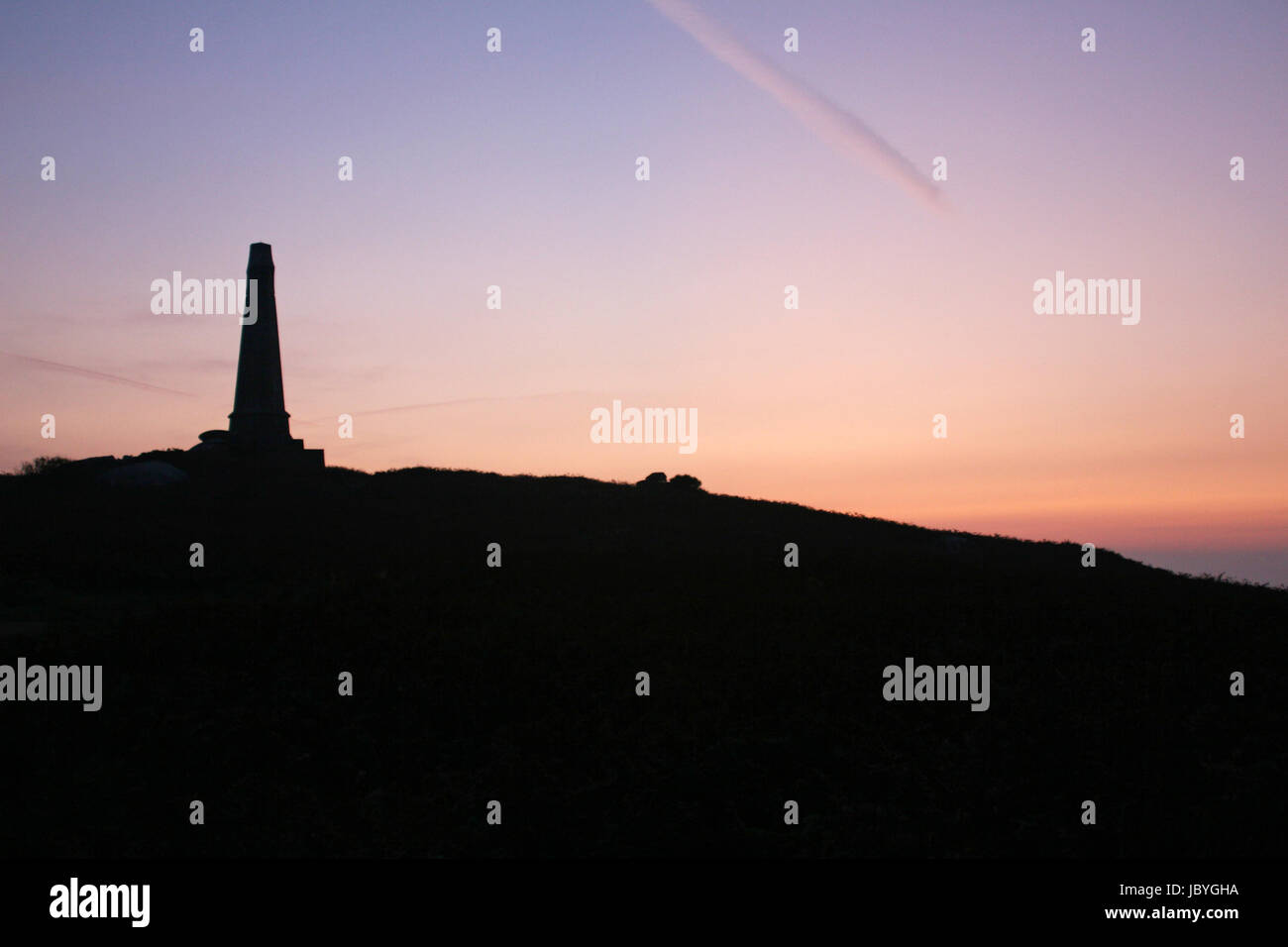 Carn Brea monument in Redruth at sunset Stock Photo - Alamy