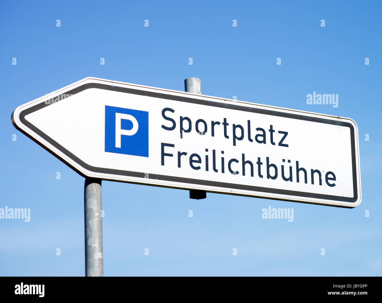 Signpost to the sports field and open air theater Stock Photo - Alamy