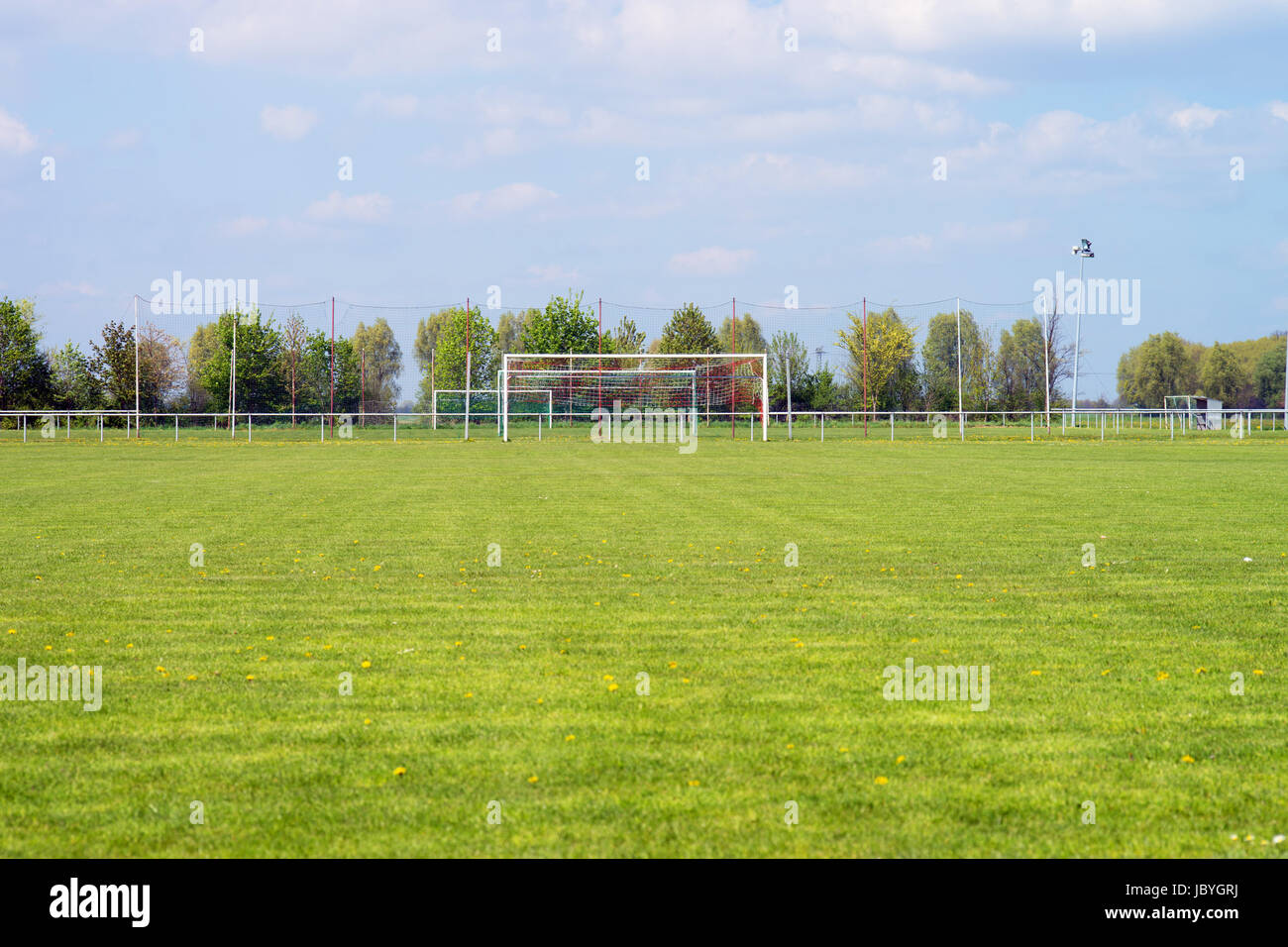 Football field with soccer net Stock Photo - Alamy