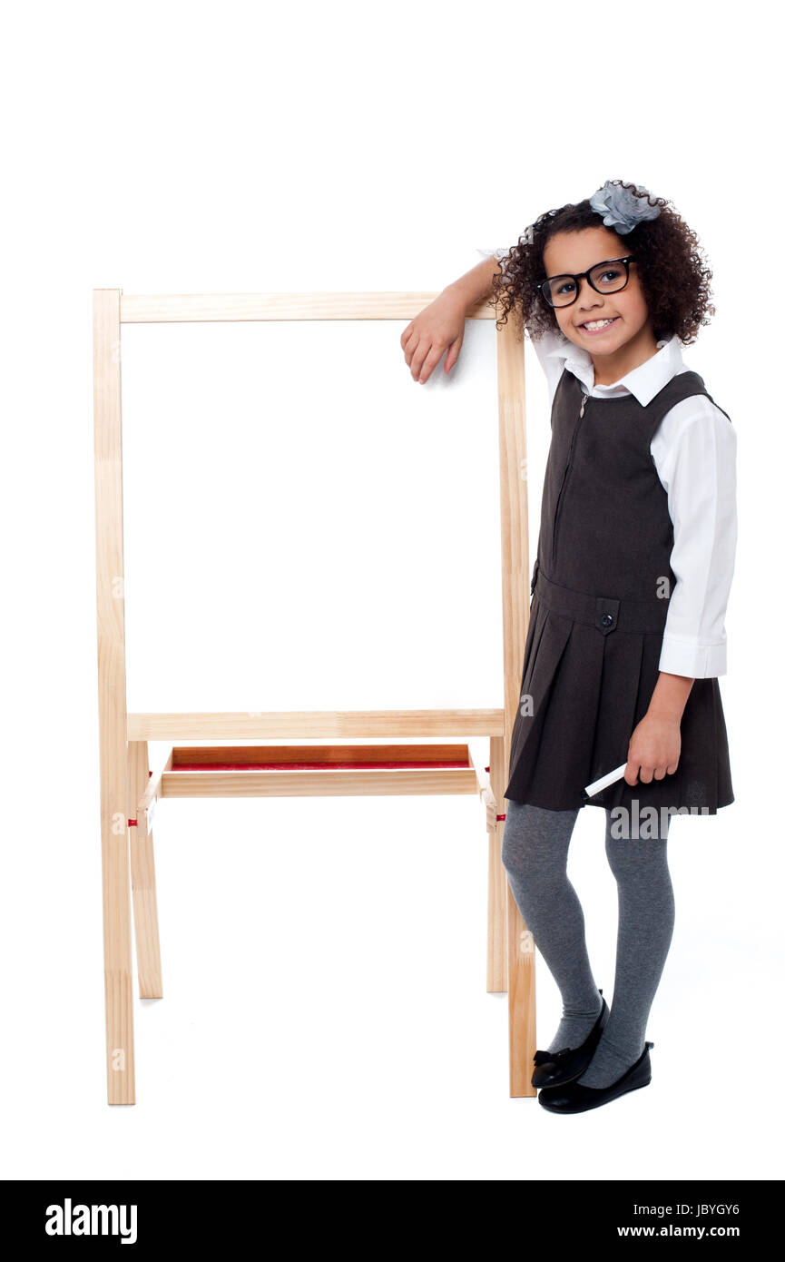 School girl resting her hand on blank whiteboard Stock Photo - Alamy