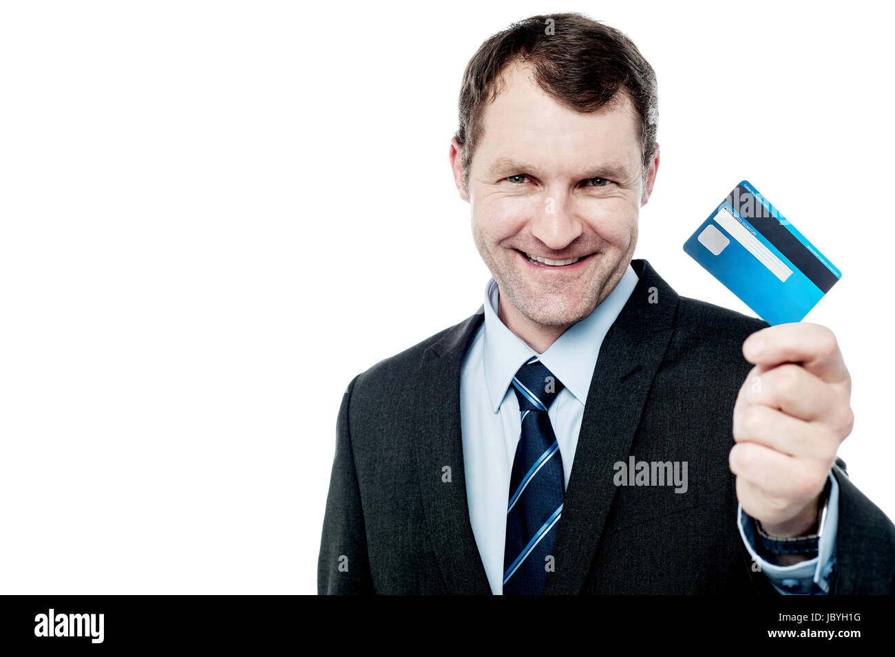 Handsome corporate man showing his credit card Stock Photo - Alamy