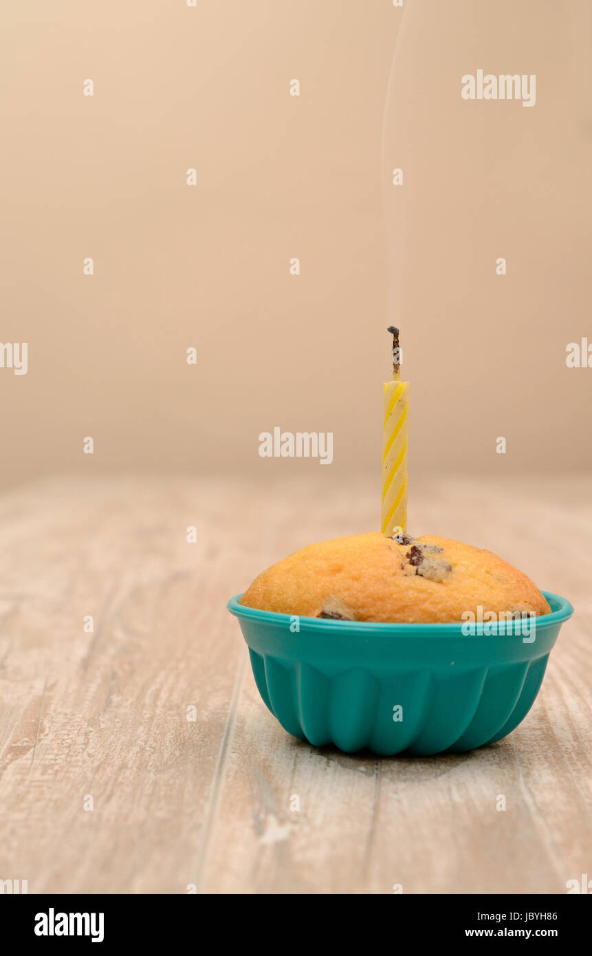 Birthday cake with one candle light Stock Photo - Alamy
