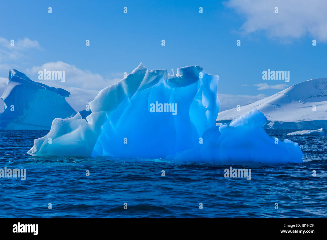 Blue shimmering beautiful iceberg in Antarctica Stock Photo - Alamy