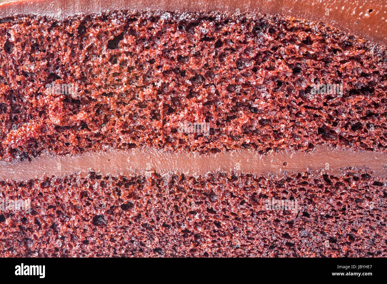 Close up sponge of chocolate custard cake Stock Photo - Alamy