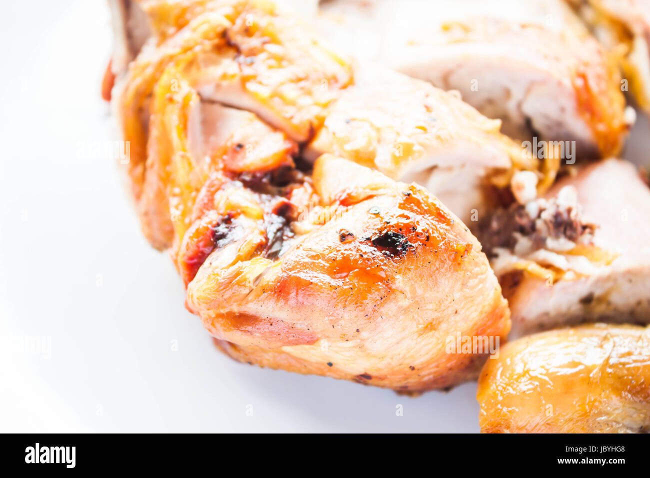 Chicken grilled serving on white dish, stock photo Stock Photo - Alamy