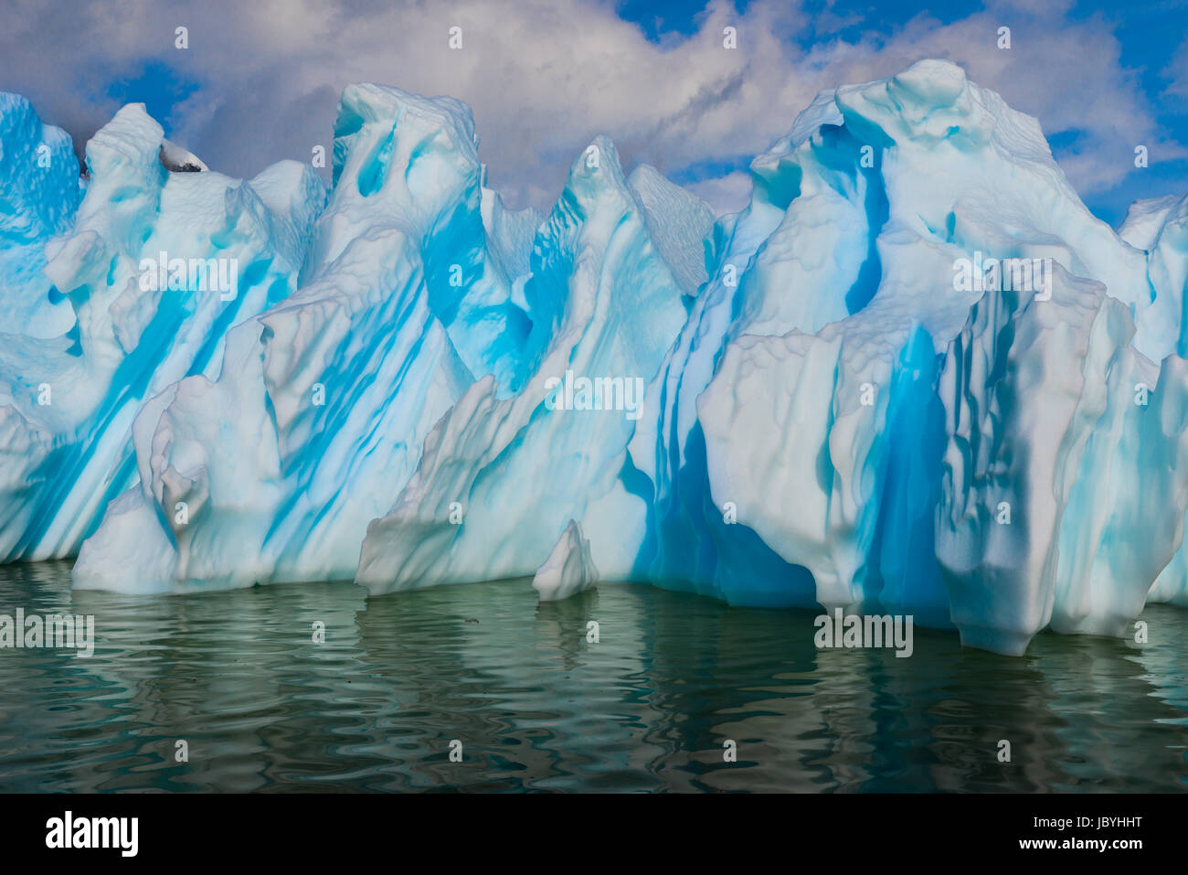 Blue shimmering beautiful iceberg in Antarctica Stock Photo - Alamy