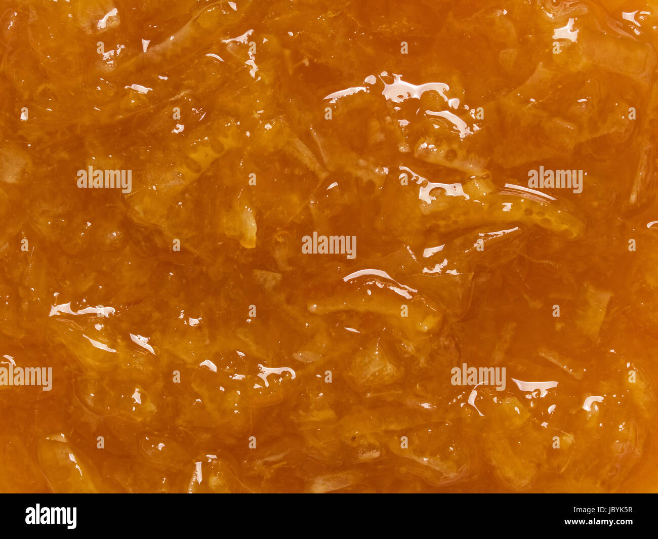 close up of orange marmalade preserve food texture background Stock ...