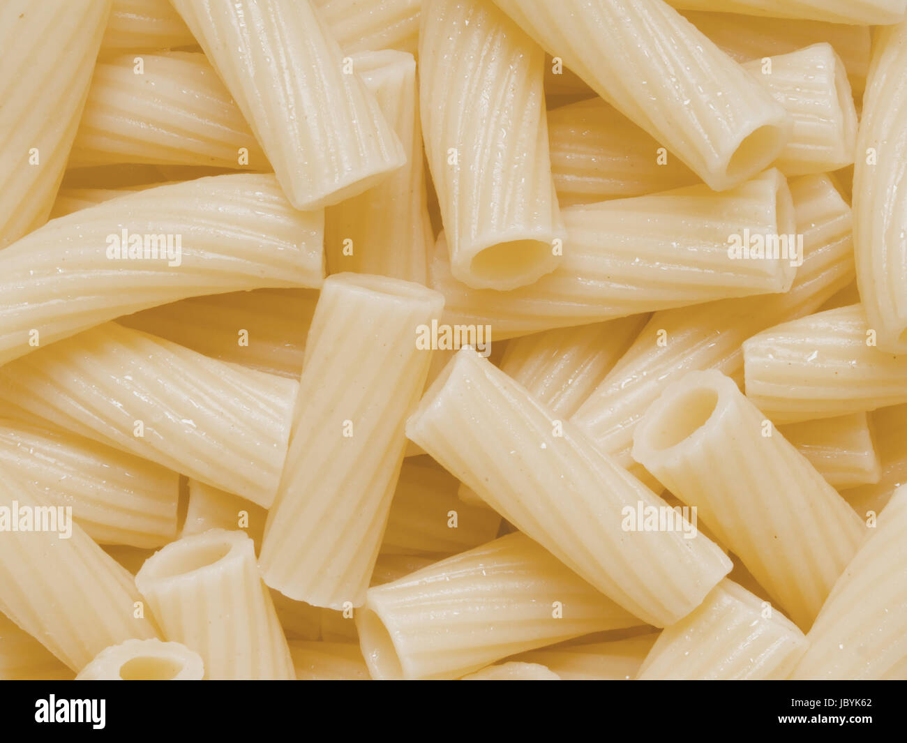 close up of cooked maccheroni pasta tubes food texture background Stock ...