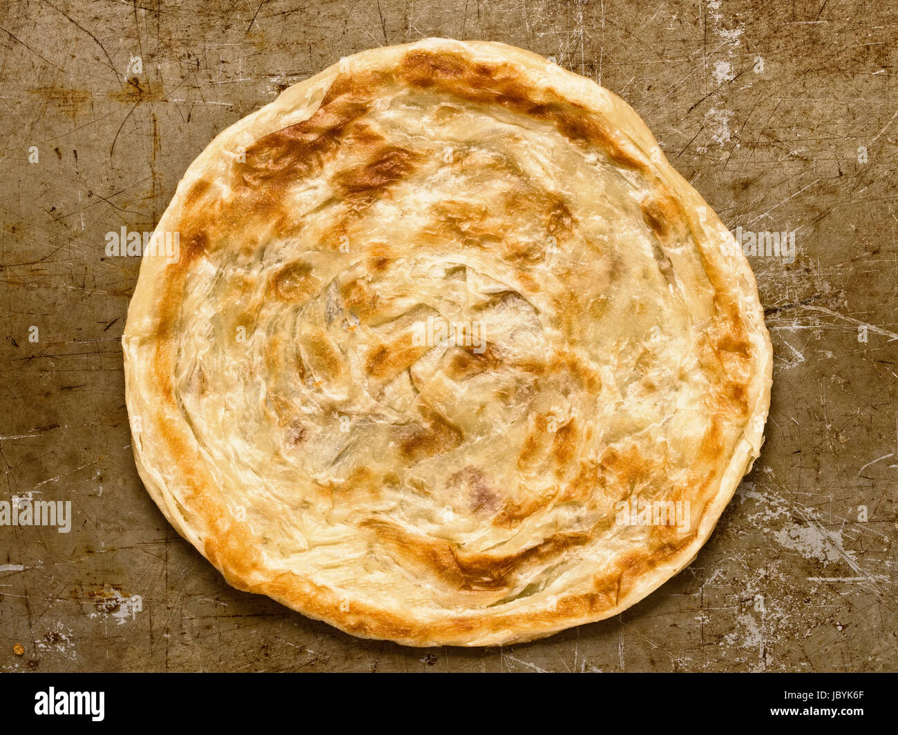 close up of rustic indian roti paratha fried pancake Stock Photo - Alamy