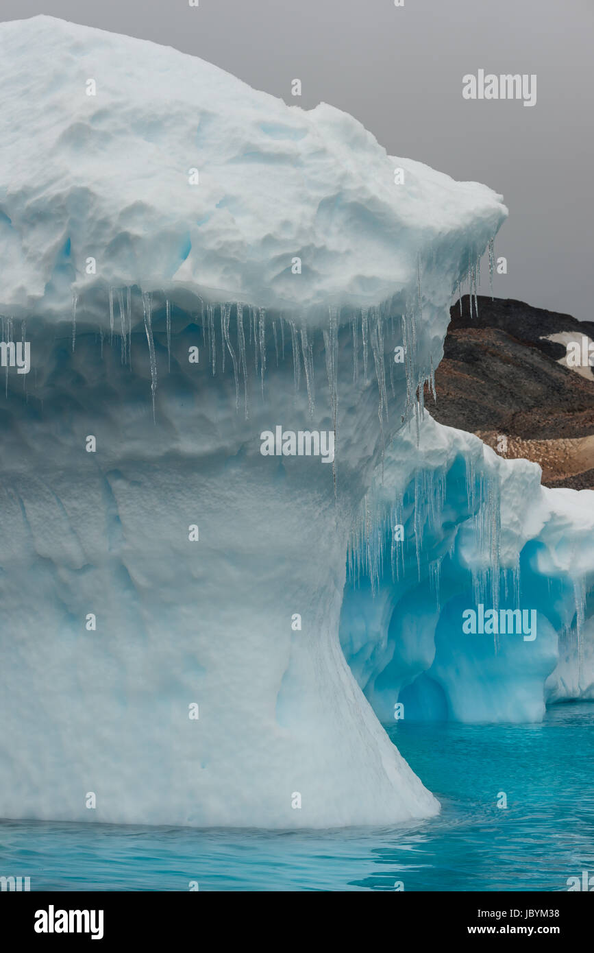 Blue shimmering beautiful iceberg in Antarctica Stock Photo - Alamy