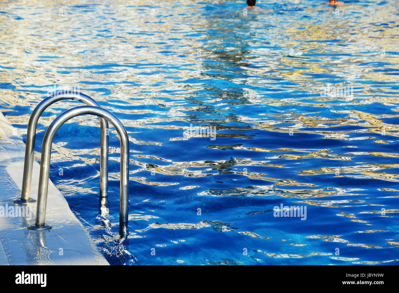Swimming pool in touristic resort during summer time Stock Photo - Alamy