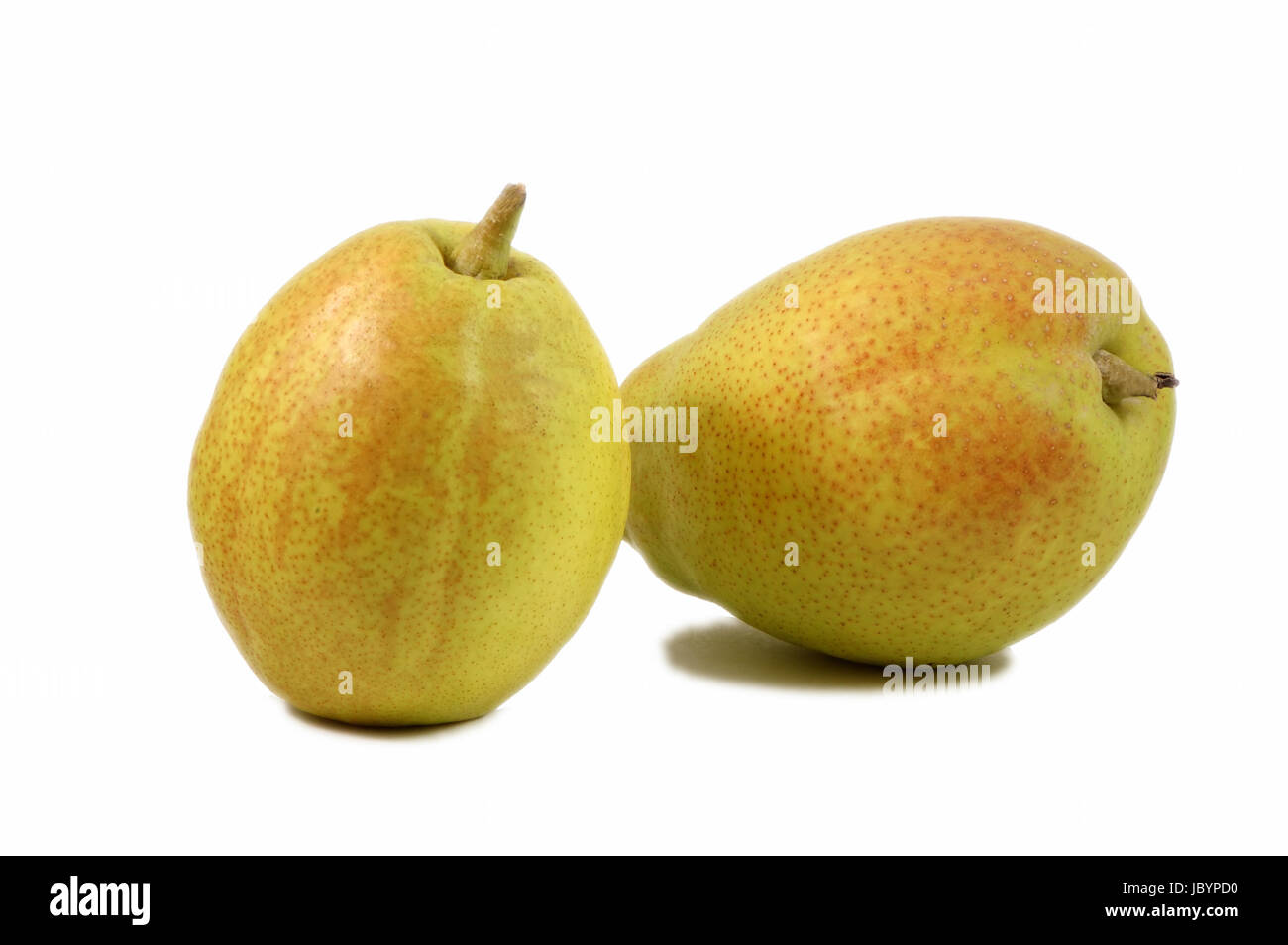 Two fragrant pears isolated over white background Stock Photo - Alamy