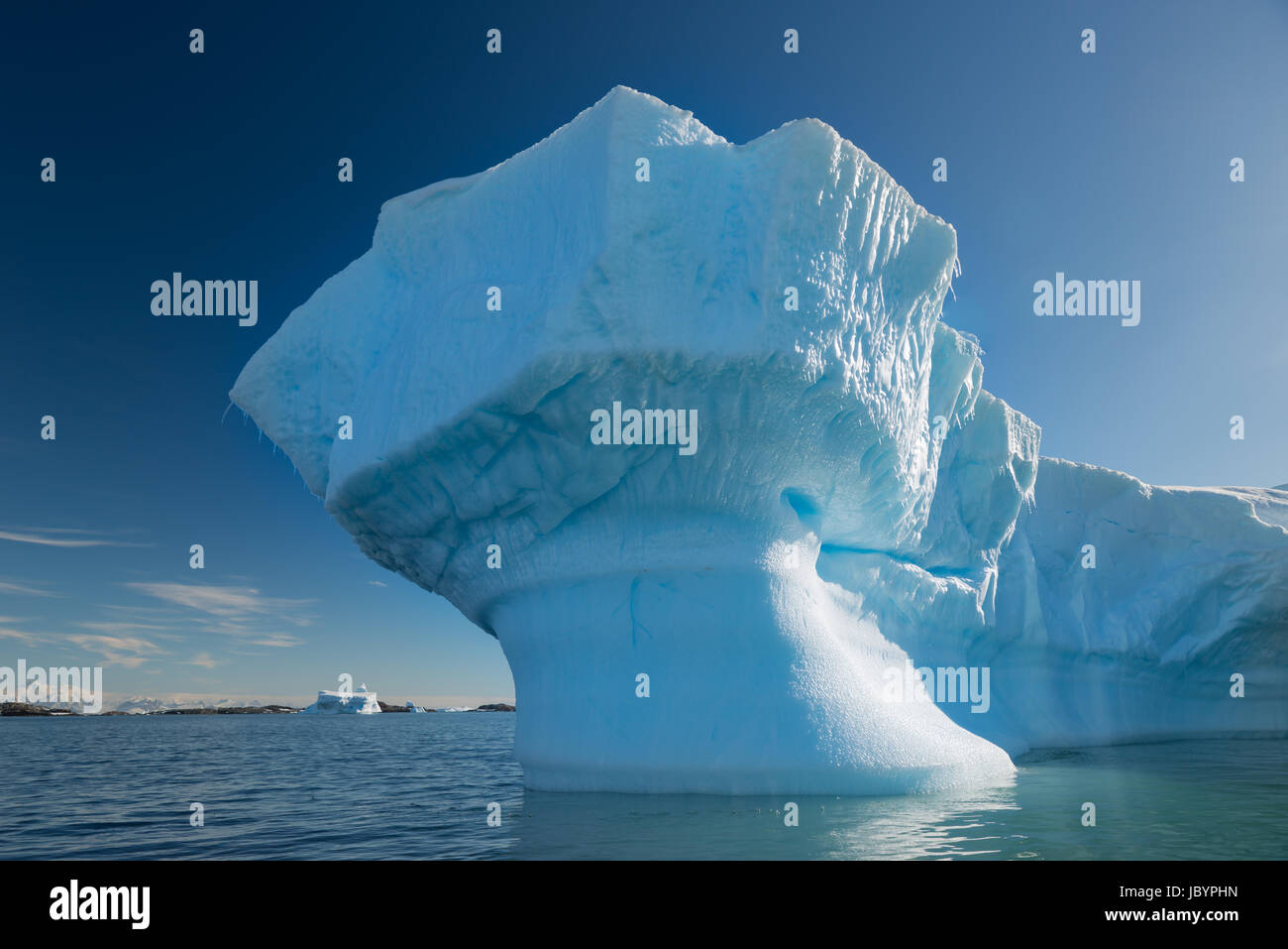 Blue shimmering beautiful iceberg in Antarctica Stock Photo - Alamy