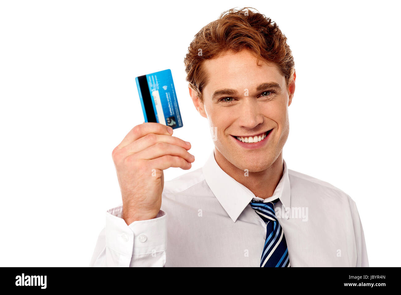 Handsome young man showing his debit card to camera Stock Photo - Alamy